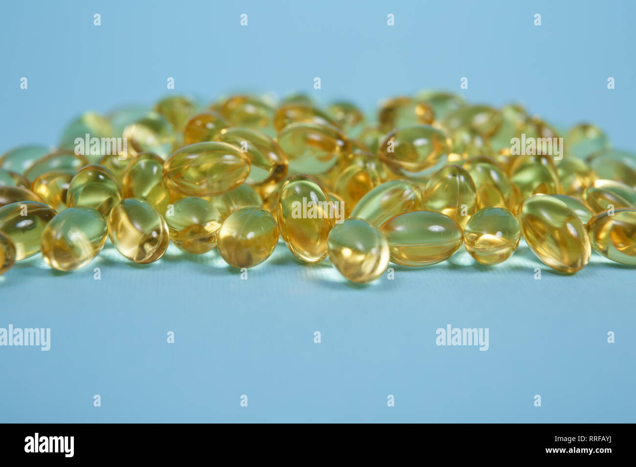 Capsules with fats for diet and healthy eating with a copy of space ...