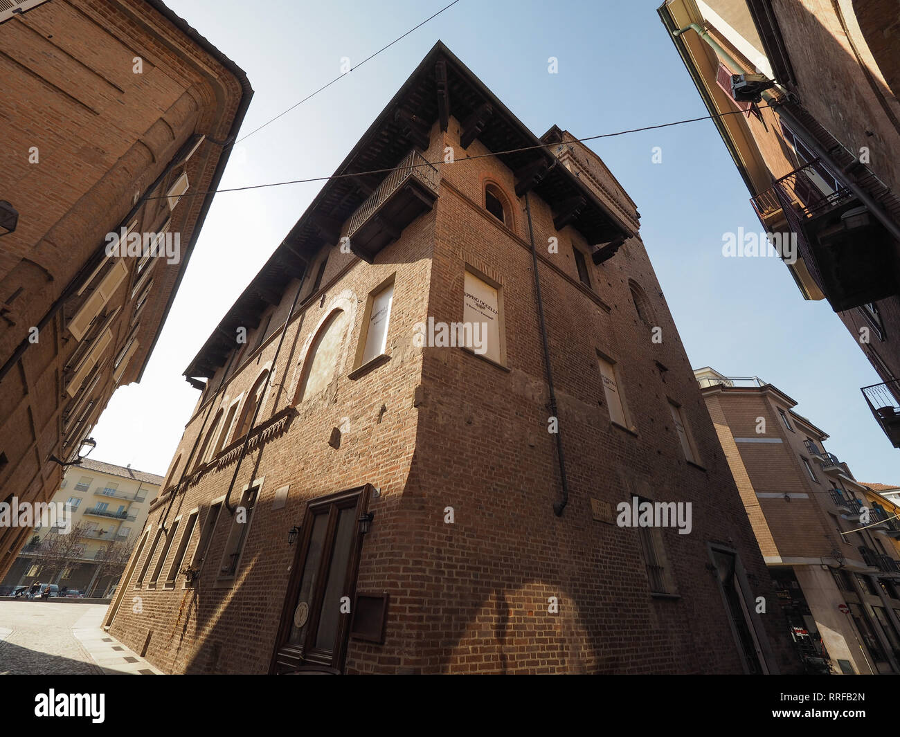 THE CITY OF ALBA, ITALY - CIRCA FEBRUARY 2019: Ancient medieval tower ...