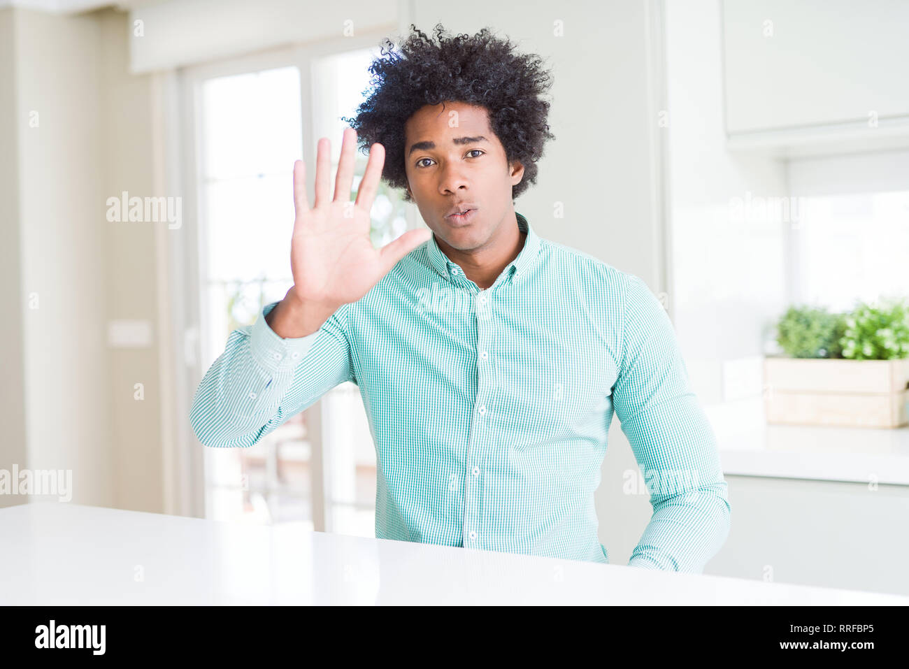 African American business man wearing elegant shirt doing stop sing ...