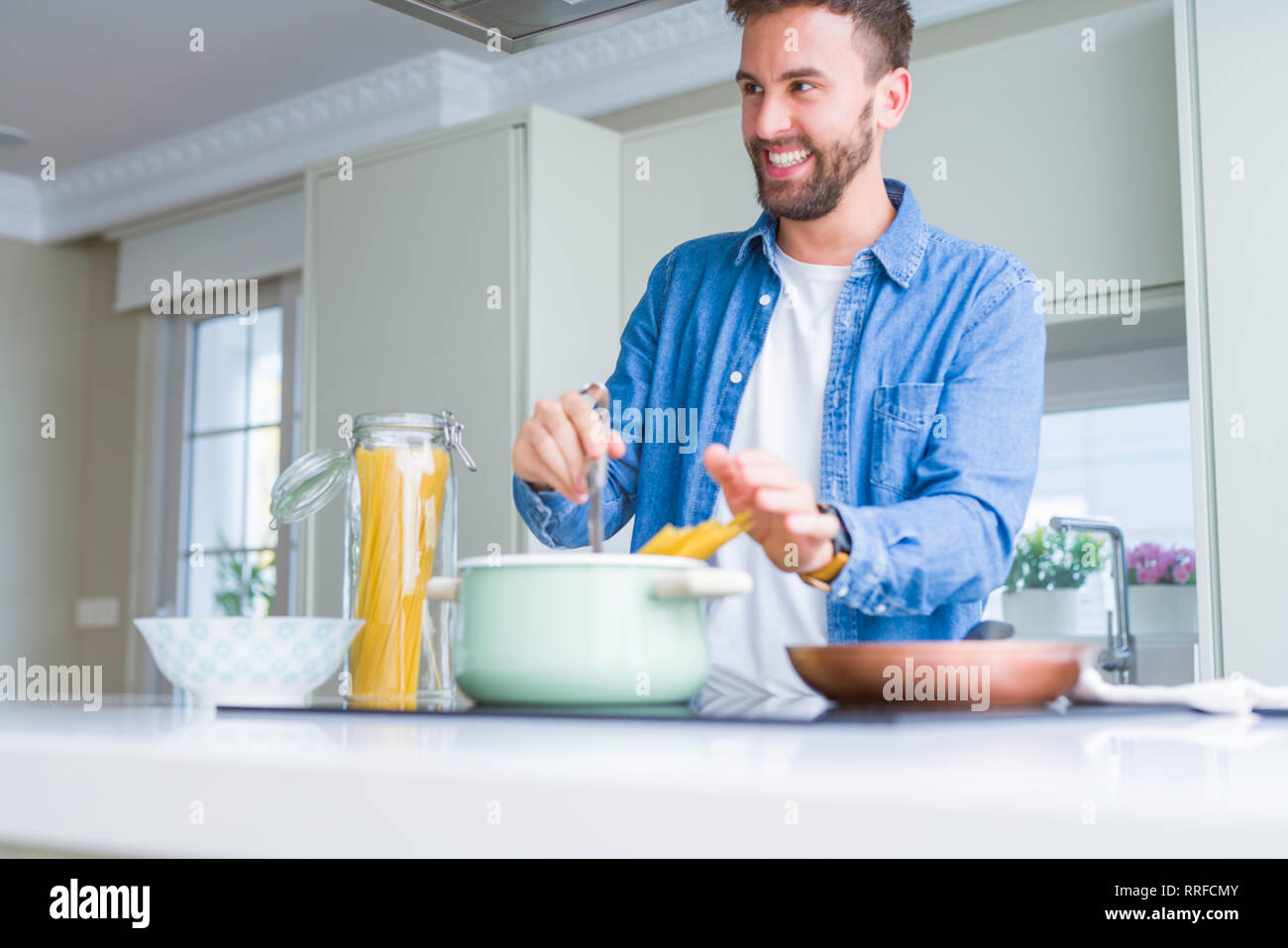 Hispanic boy eating pasta hi-res stock photography and images - Alamy