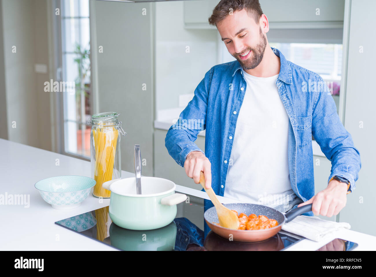 Man pasta meat vegetables hi-res stock photography and images - Alamy