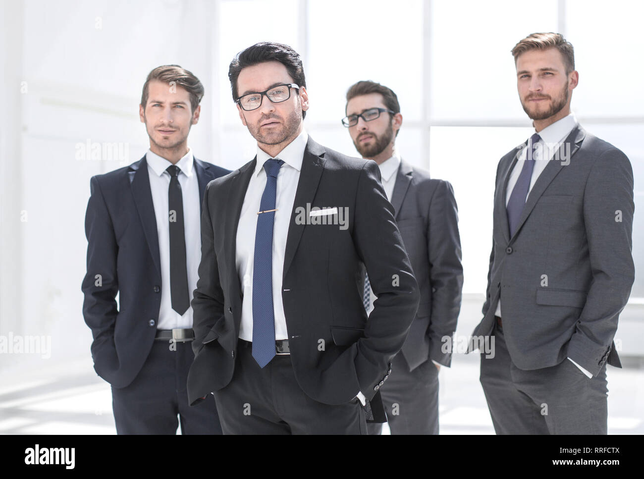 businessman and his business team standing in the office Stock Photo ...