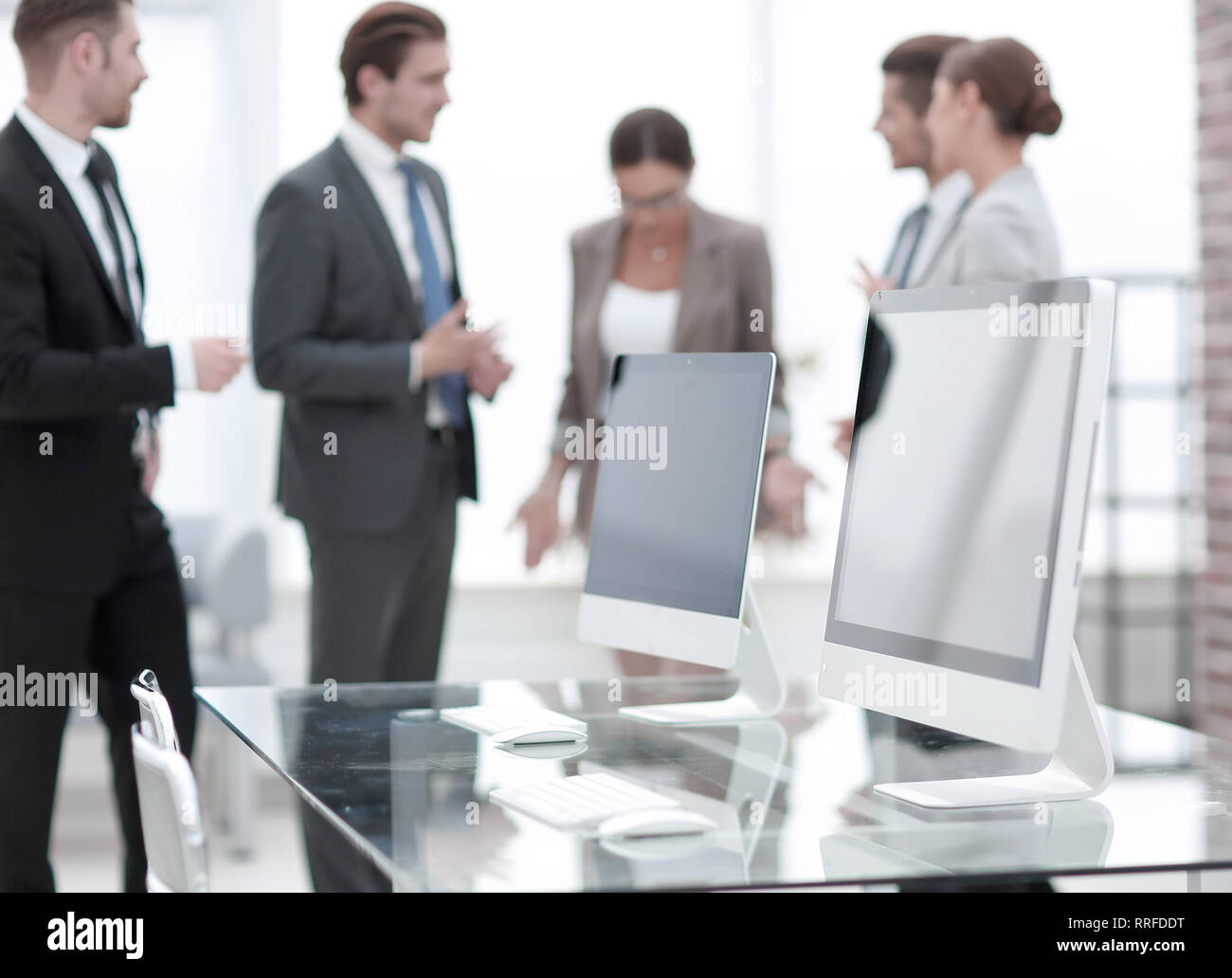 background image of a business team in a modern office Stock Photo - Alamy