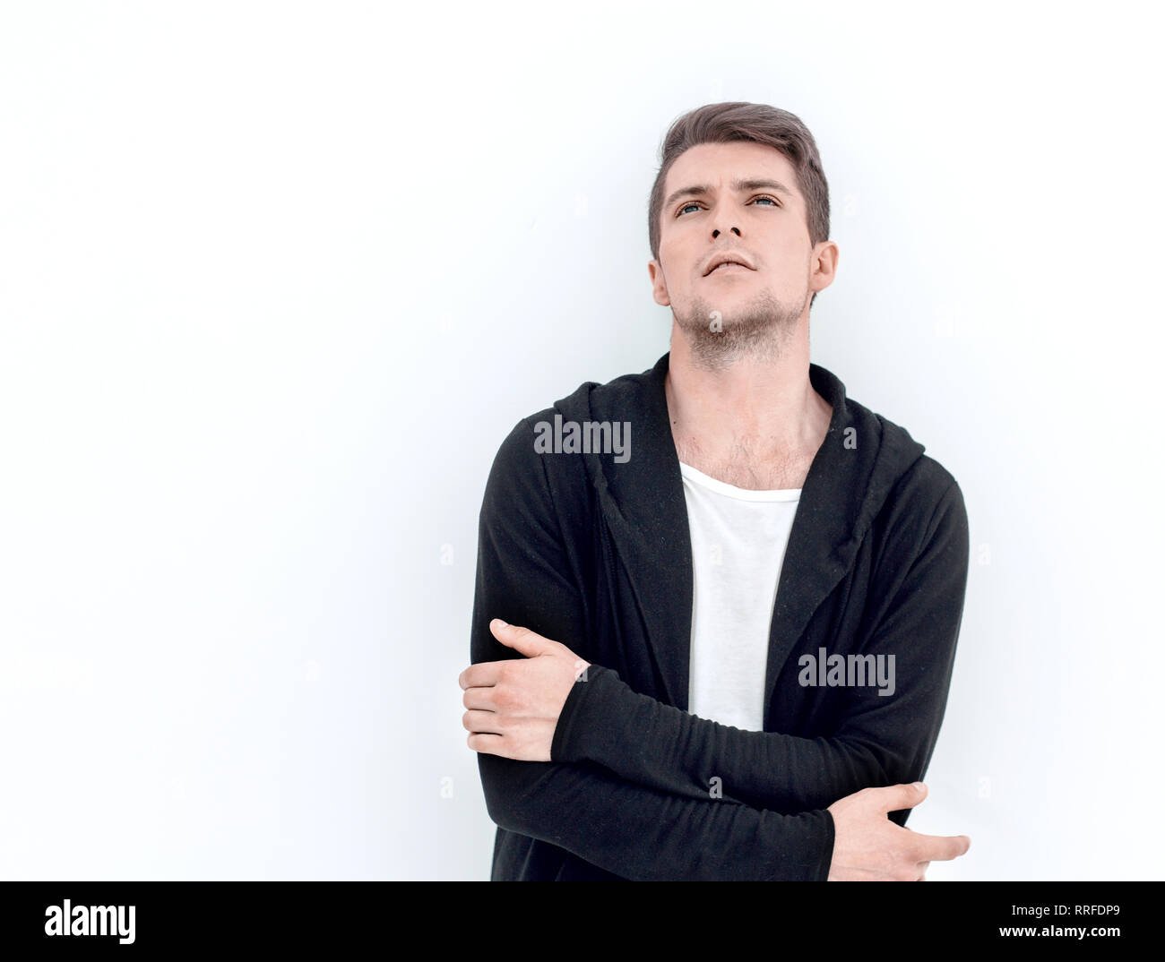 portrait of a brooding guy in a hoodie Stock Photo - Alamy