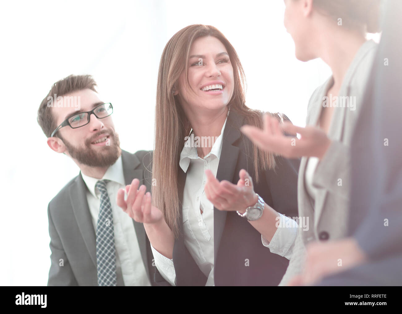close up.successful employees listen to their boss Stock Photo - Alamy
