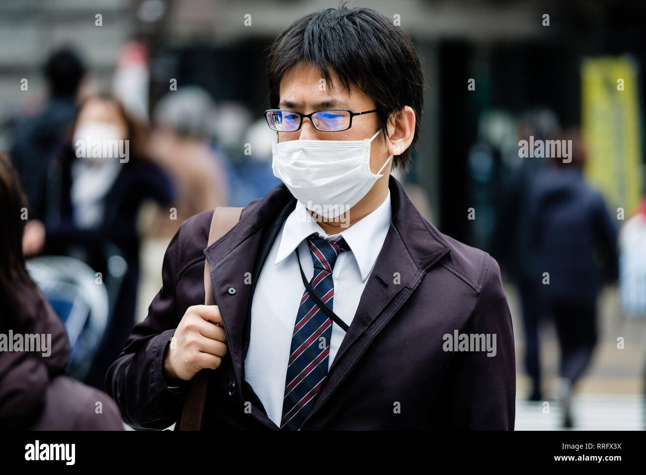 February 26, 2019 - Tokyo, Japan - A man wears a mask during the hay ...
