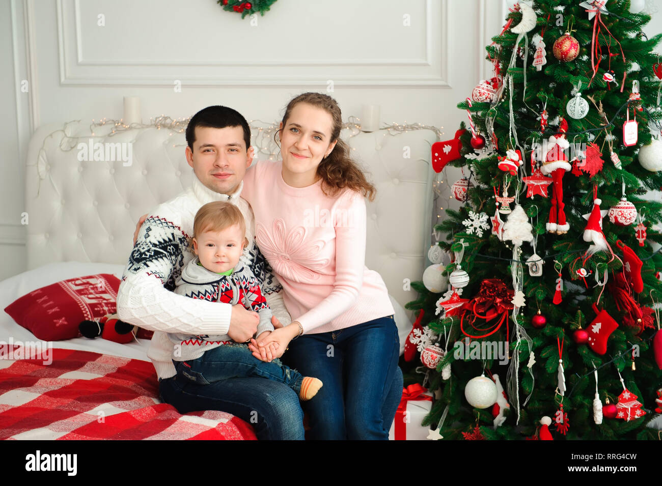 Happy family celebrating new year's eve together Stock Photo - Alamy