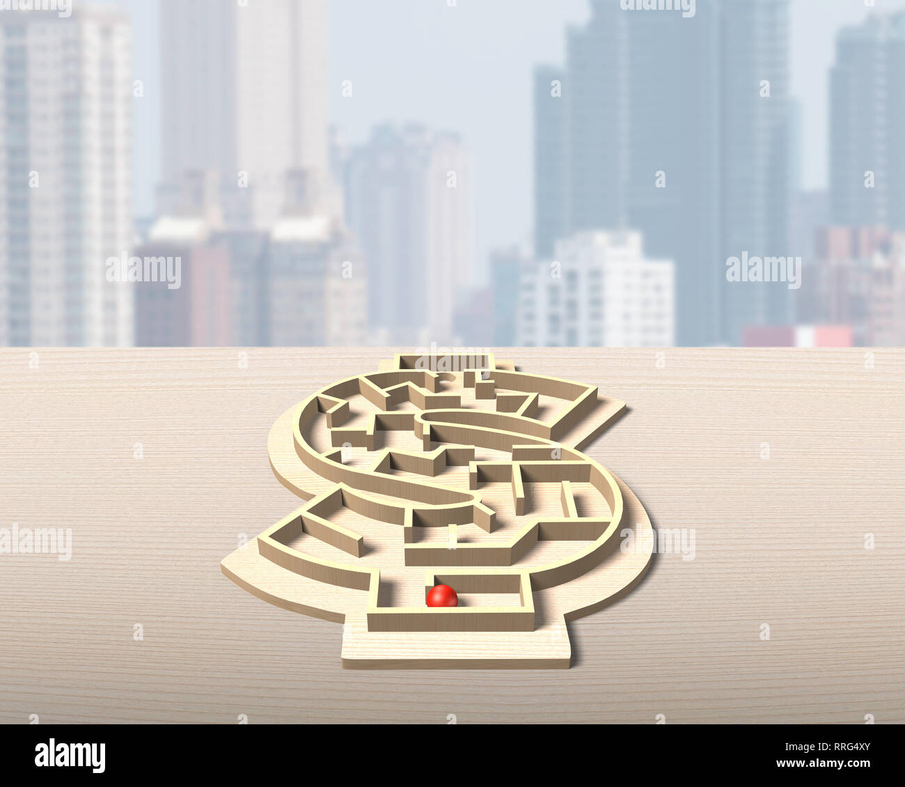Maze ball game in money shape box on table, with city buildings ...