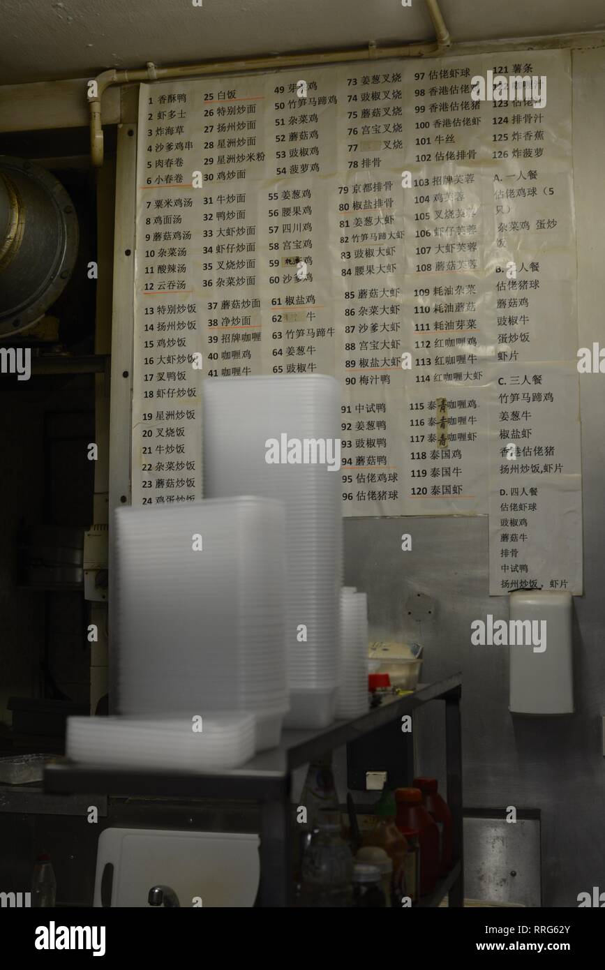 Mandarin Chinese language menu in Chinese takeaway kitchen Stock Photo ...