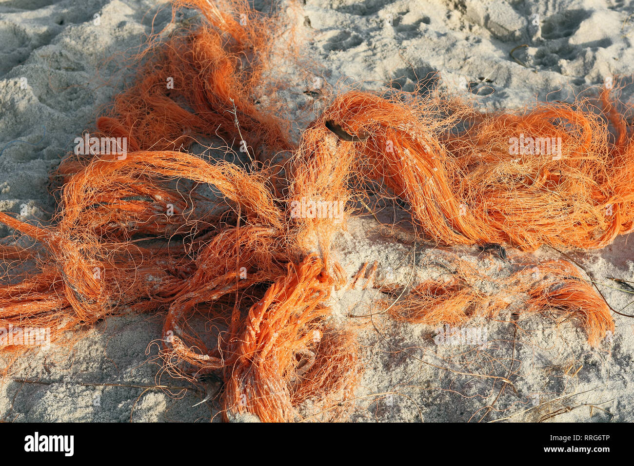 Refuse of fishing nets and plastic waste at the beach Stock Photo - Alamy