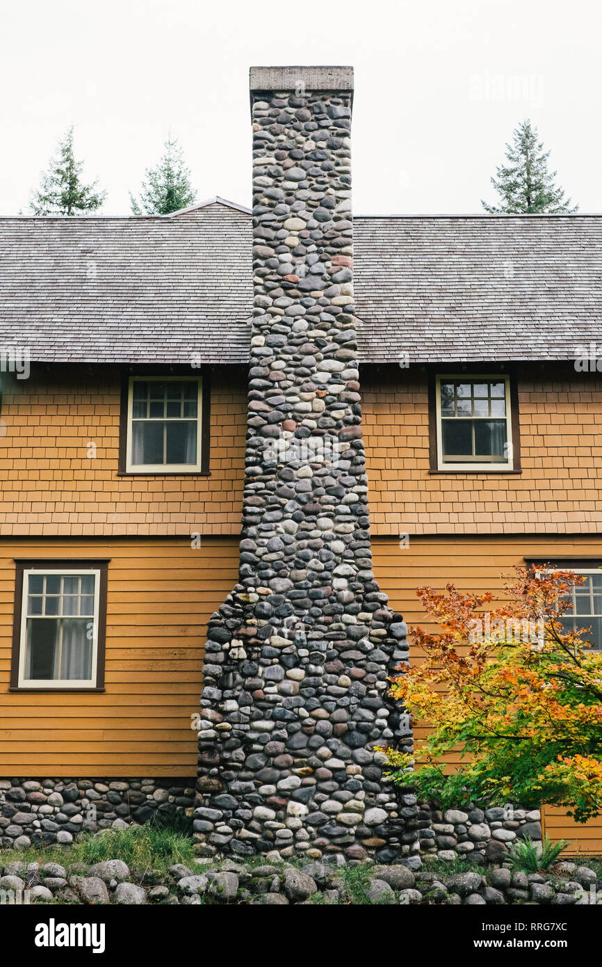 Orange House with Stone Fireplace Stock Photo - Alamy