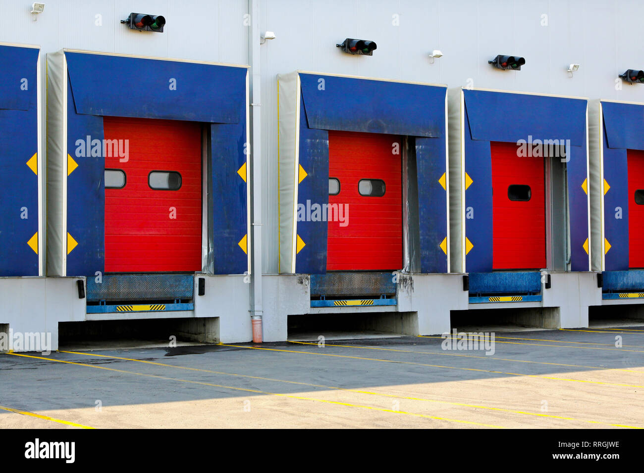 Loading dock cargo doors at big warehouse Stock Photo - Alamy