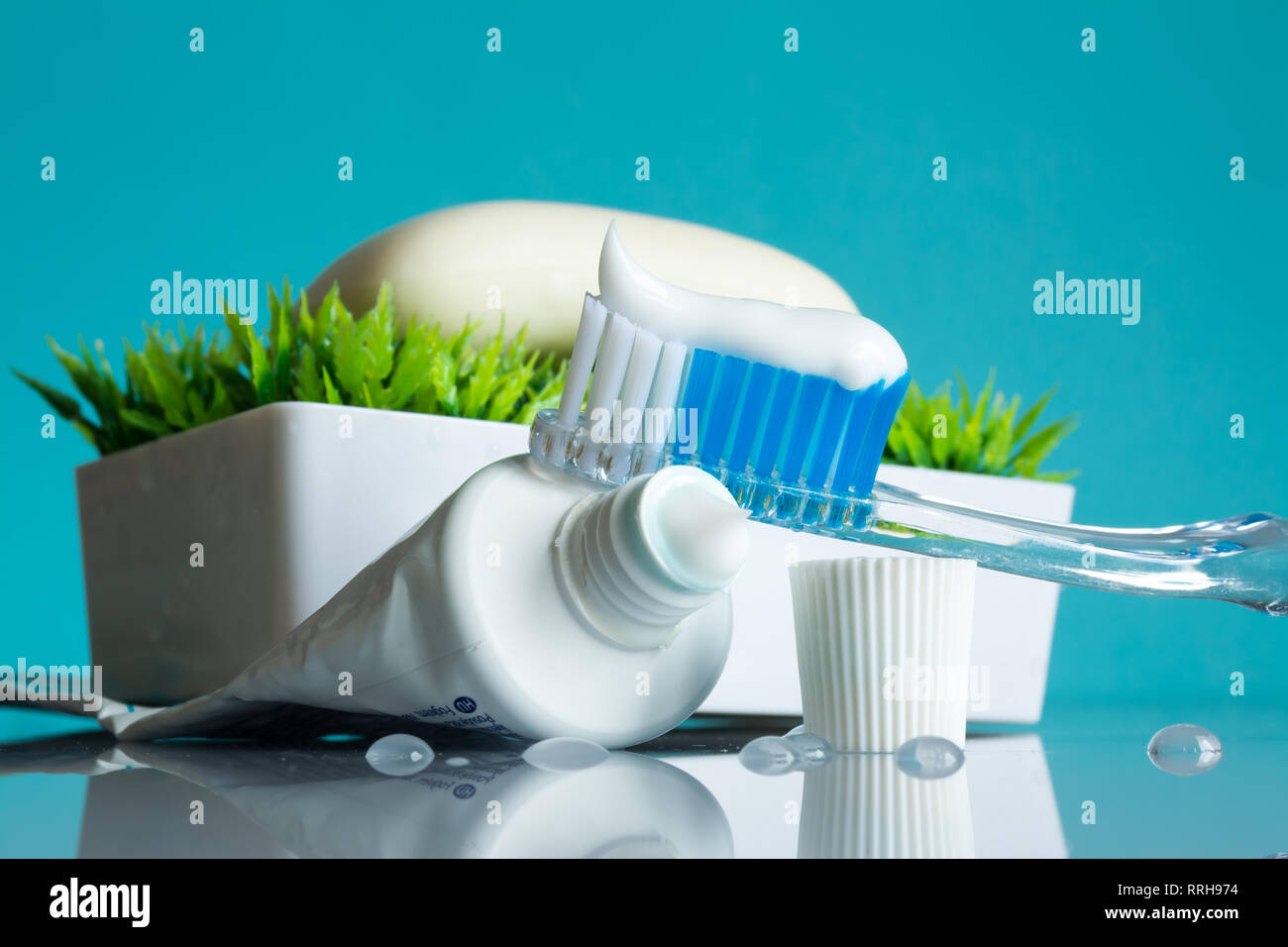 Toothbrush And Toothpaste In Cup High Resolution Stock Photography and ...