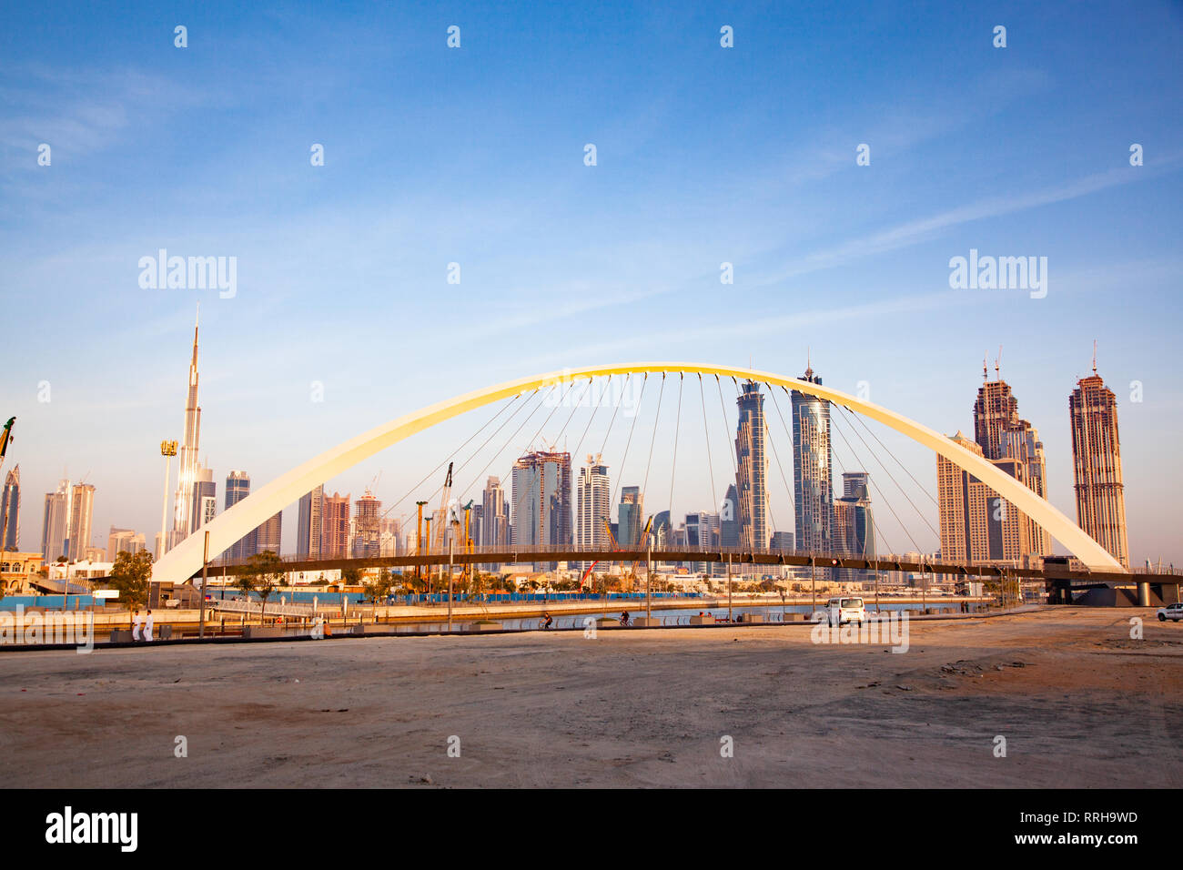 colorful sunset over Dubai Downtown skyscrapers and the newly built ...