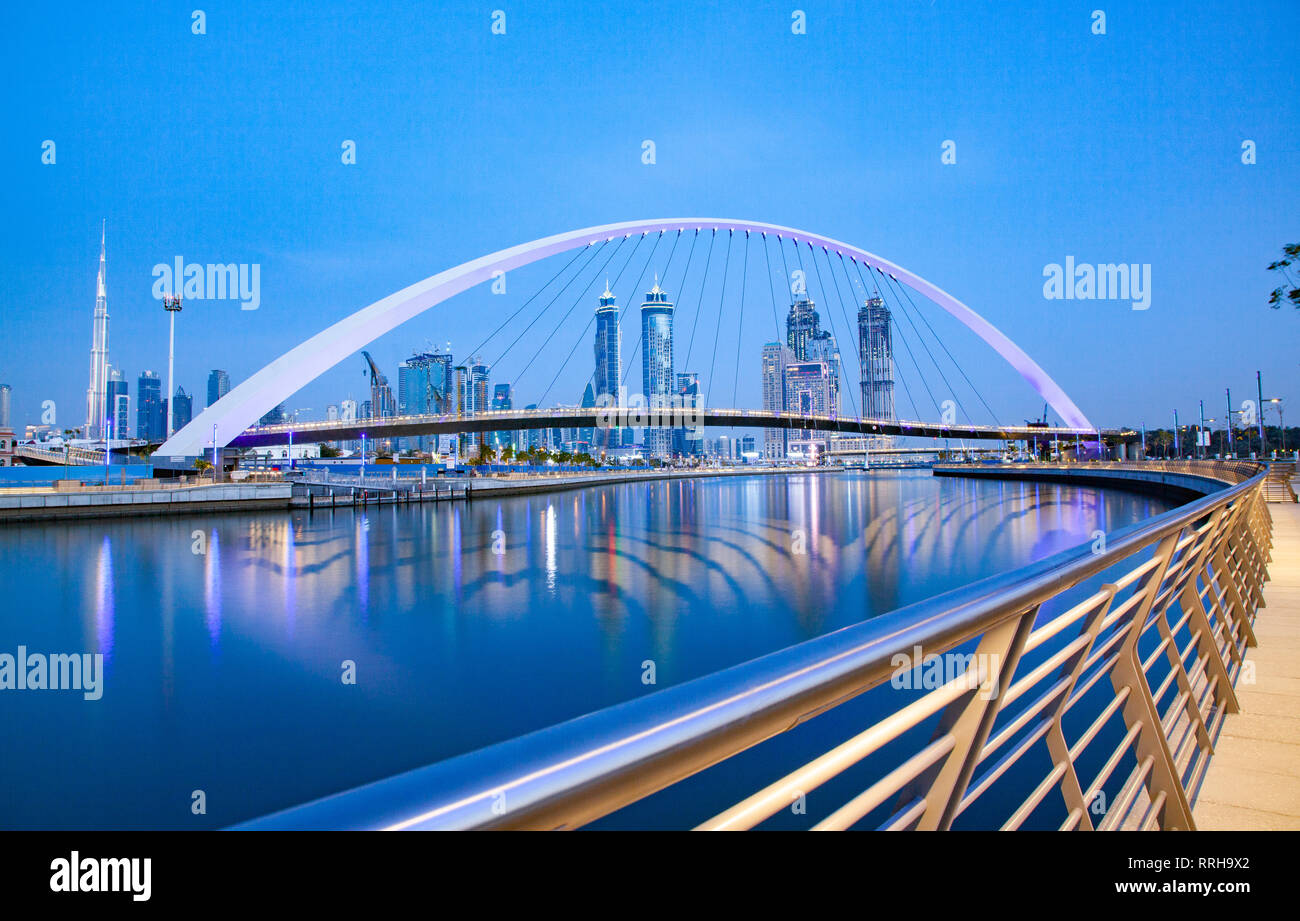 colorful sunset over Dubai Downtown skyscrapers and the newly built ...
