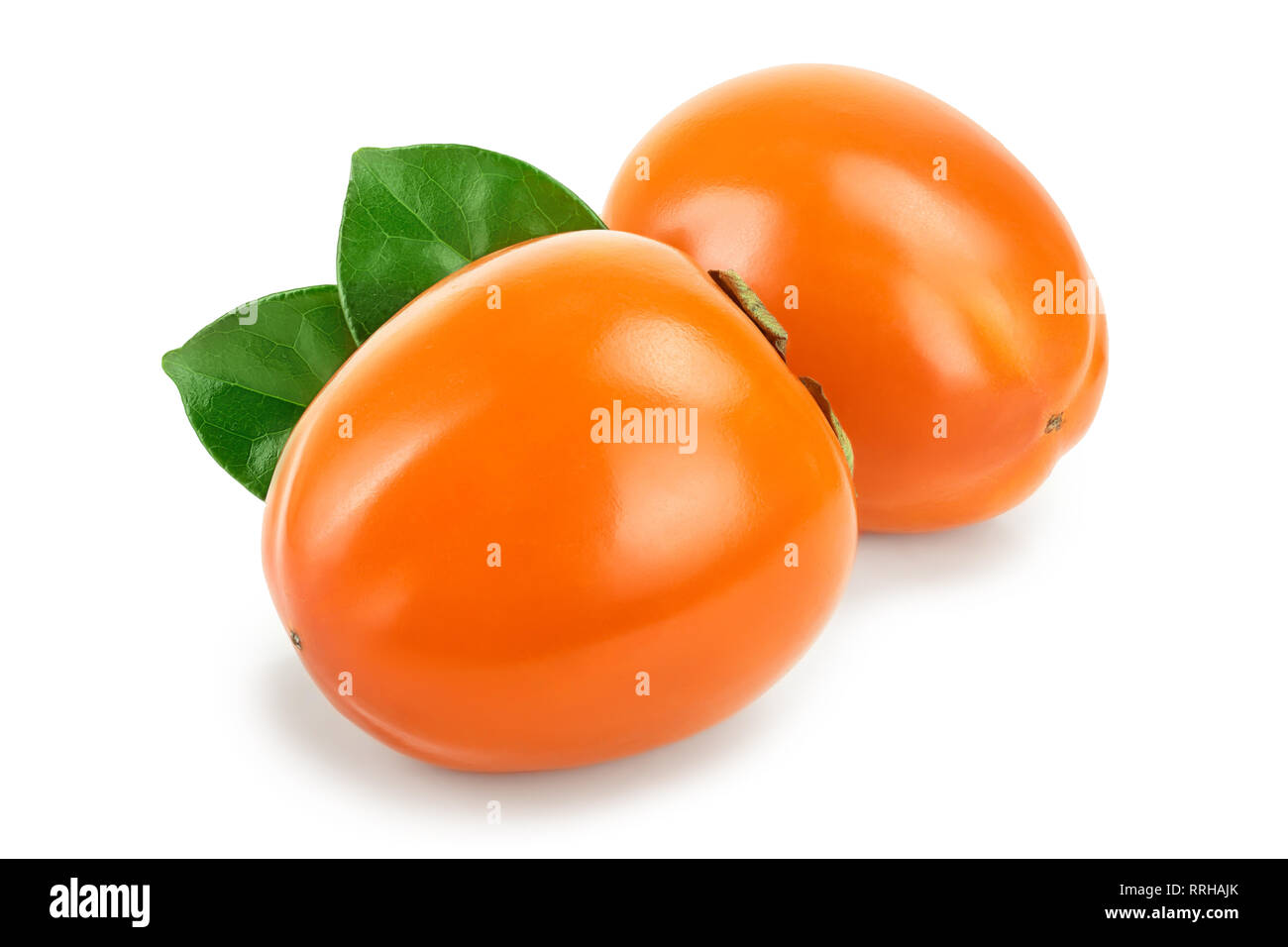 Persimmon fruit with leaves isolated on white background close-up Stock ...
