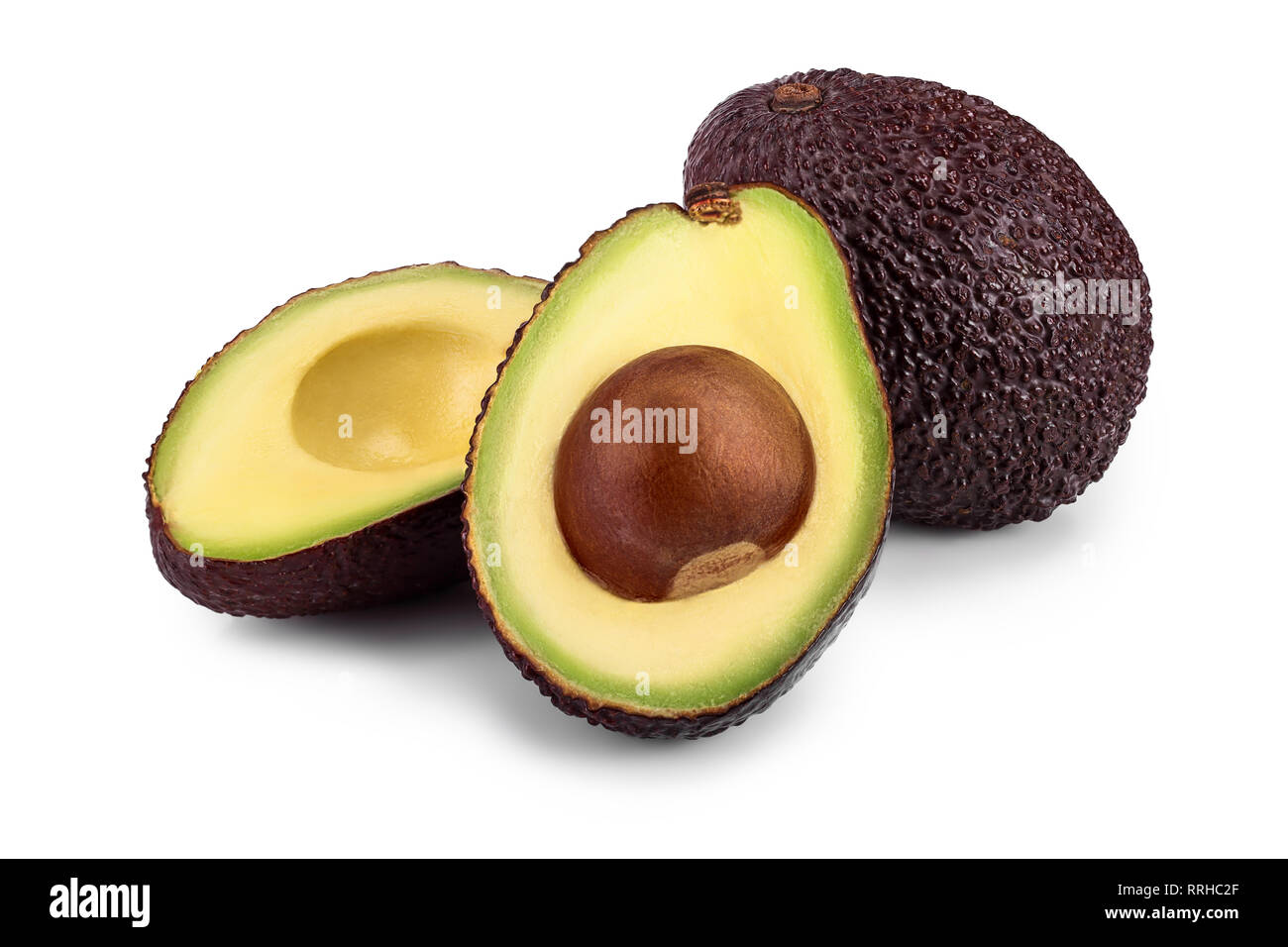 avocado and half isolated on white background Stock Photo - Alamy