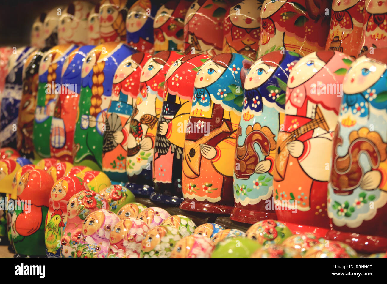 A lot of souvenirs of nesting dolls. Many colored nesting dolls Stock ...