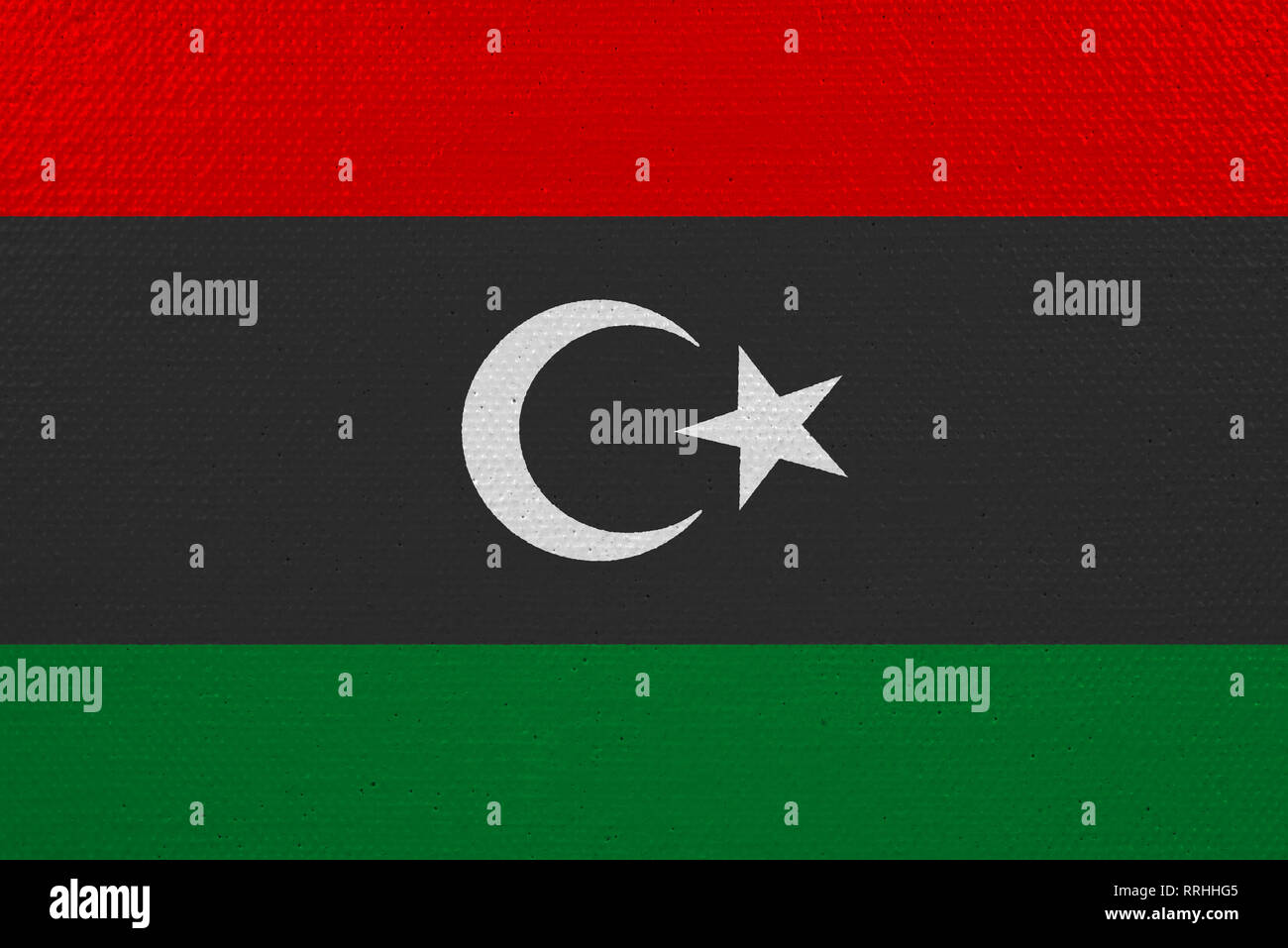 libya flag on canvas. Patriotic background. National flag of libya ...