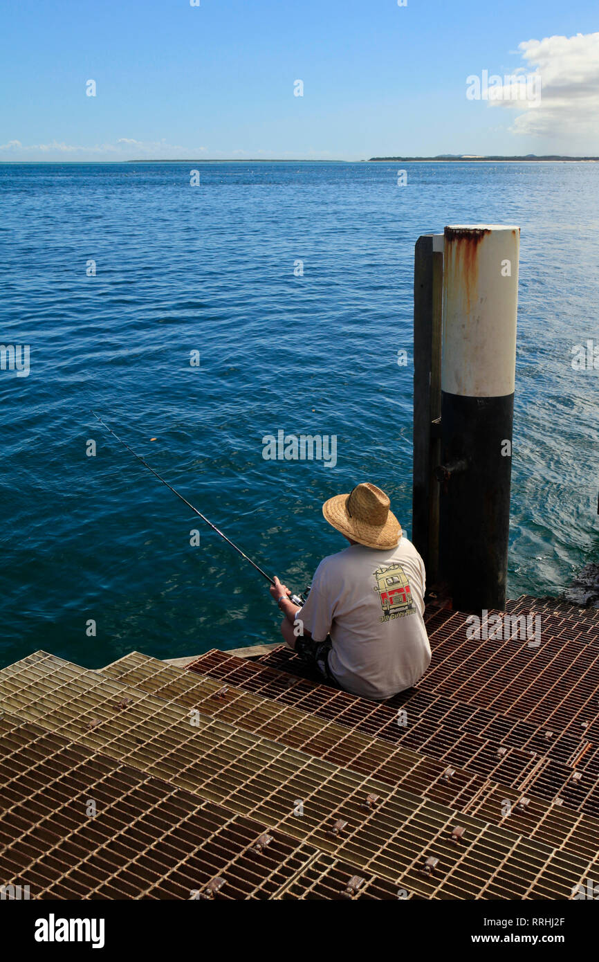 Old man fishing Stock Photo - Alamy