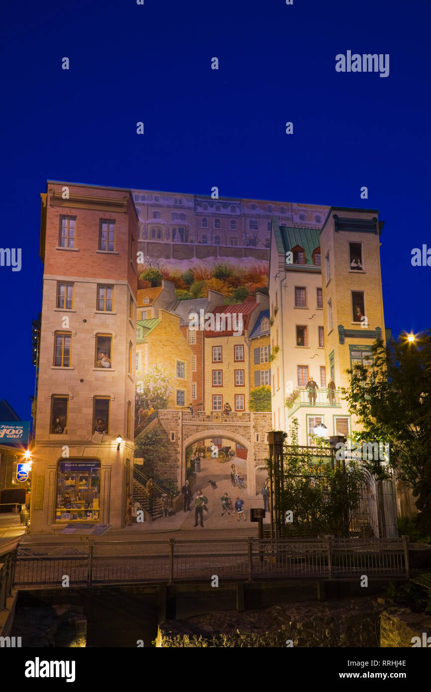 La Fresque des Quebecois wall mural illuminated at night, Notre-Dame ...