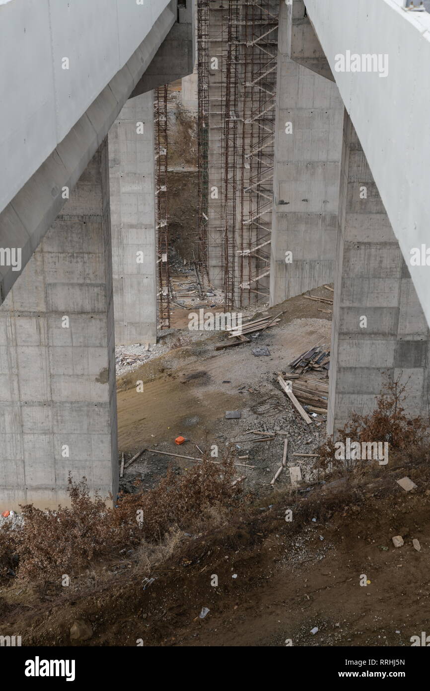 Bottom view on the bridge. Big concrete overpass. Building of the ...