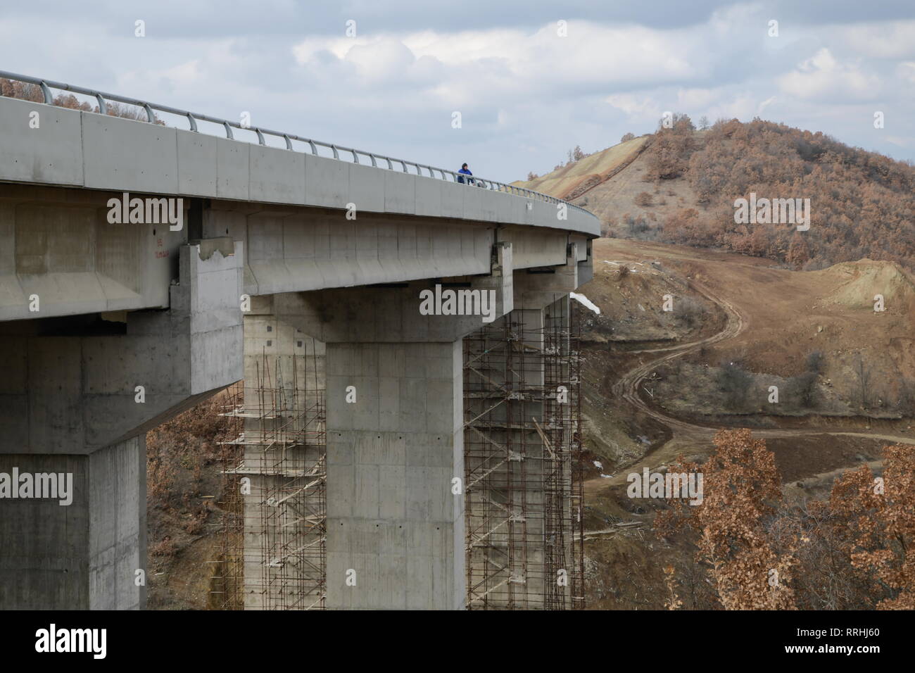 Bottom view on the bridge. Big concrete overpass. Building of the ...