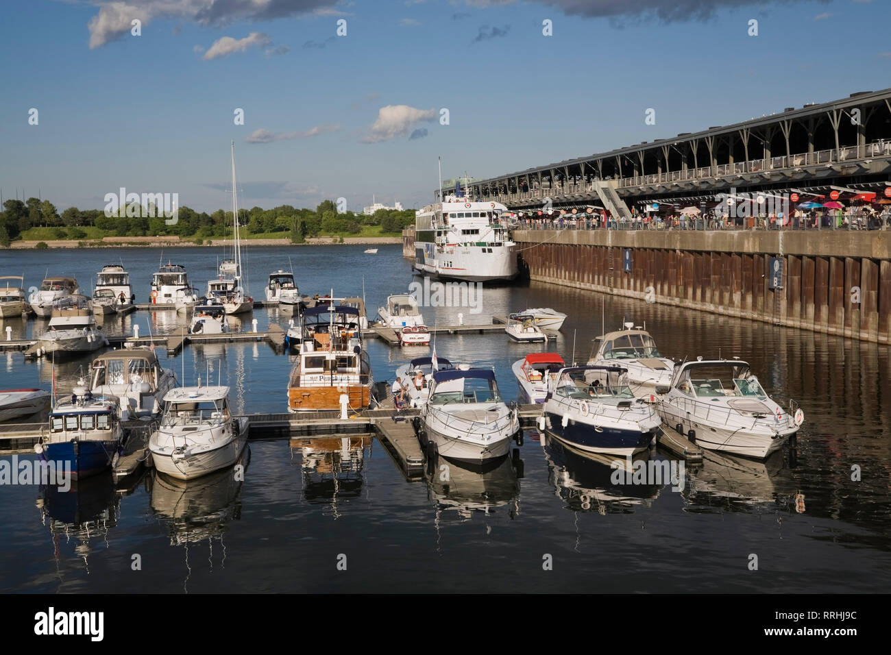 Moored power boats in marina and King Edward pier in Old Port of ...