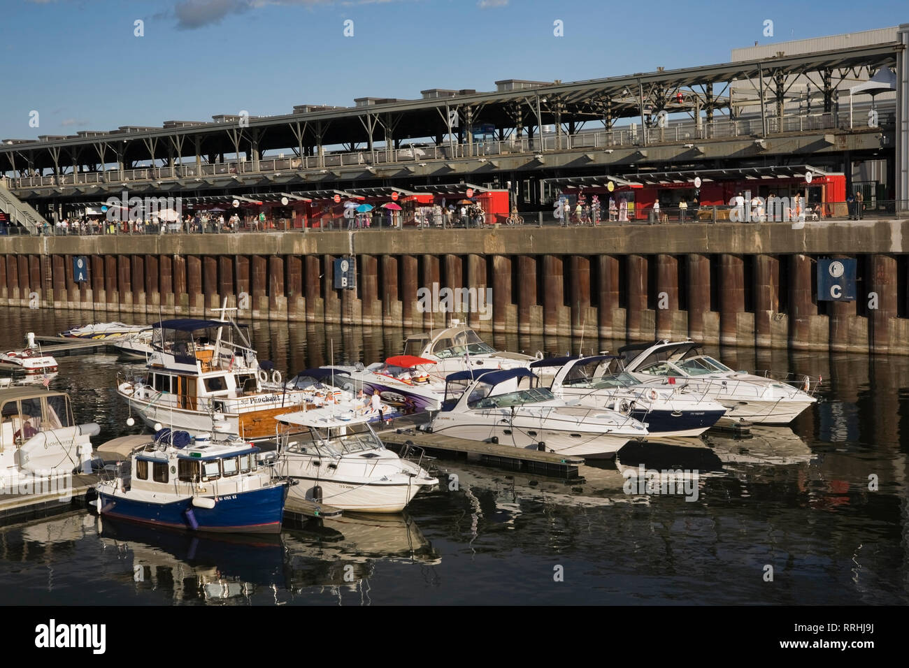 Moored power boats in marina and King Edward pier in Old Port of ...