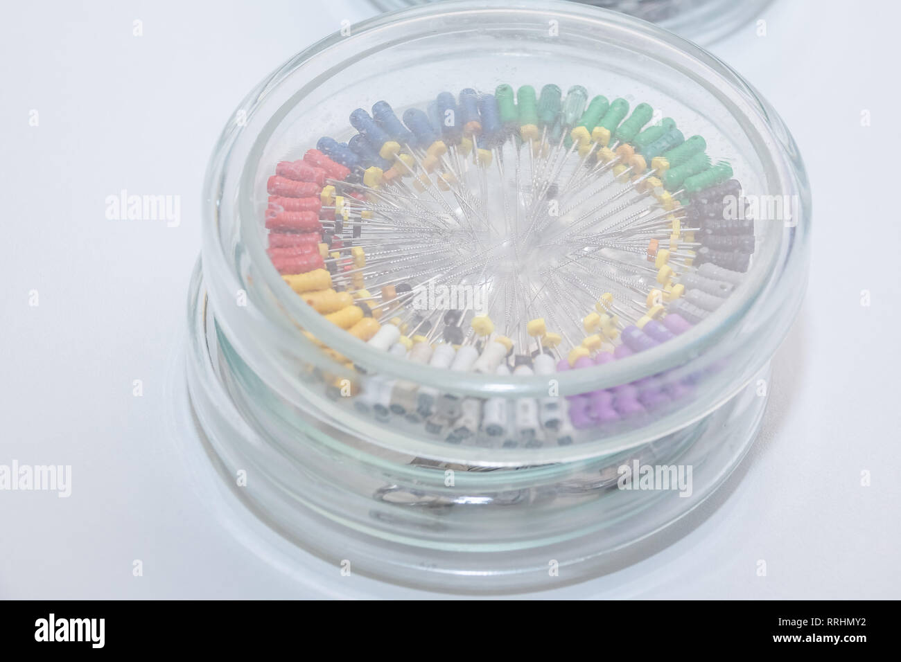 Dental tools in the glass round box. Dental instruments - k-files ...