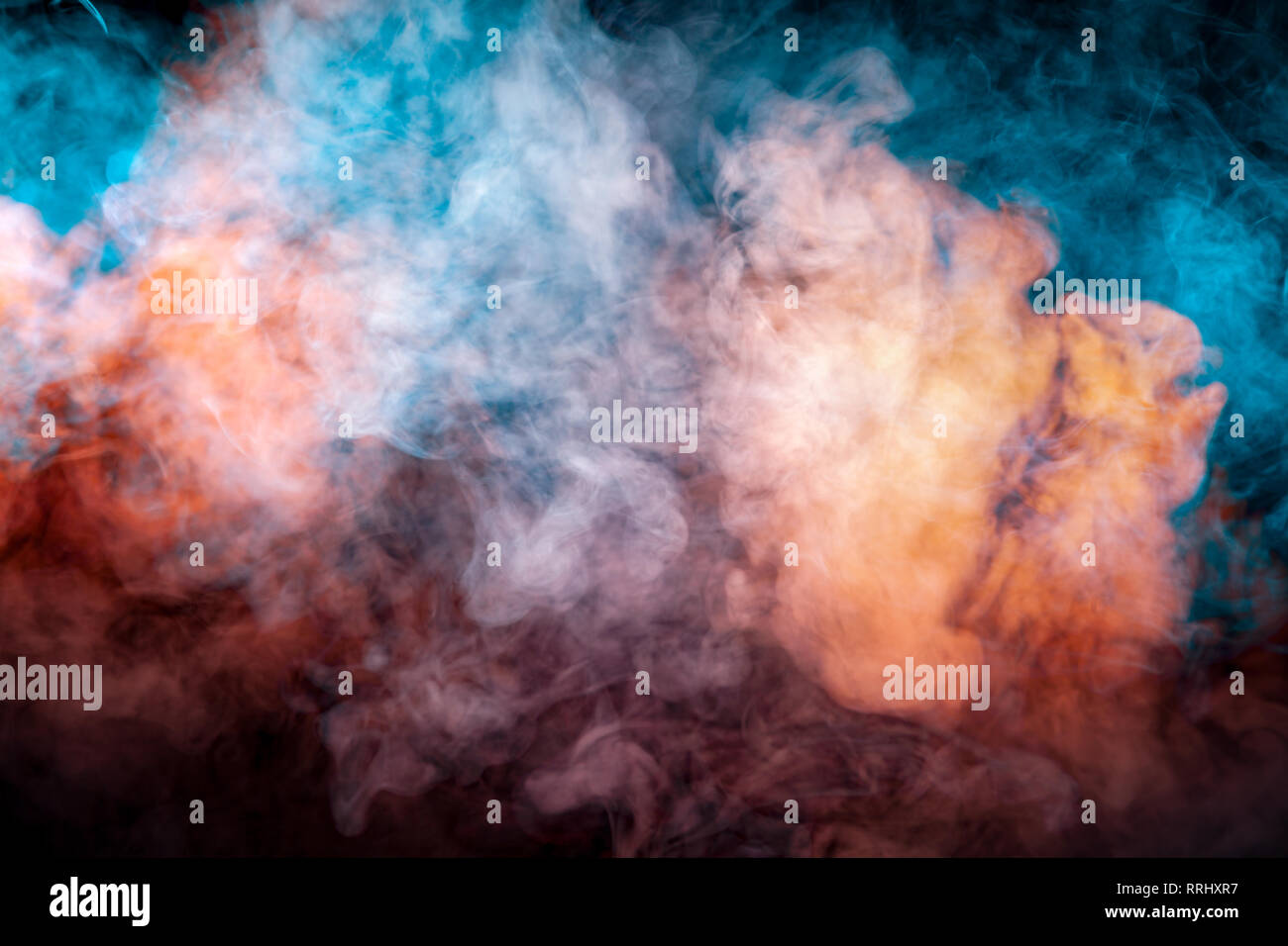 Translucent, thick smoke, illuminated by light against a dark ...