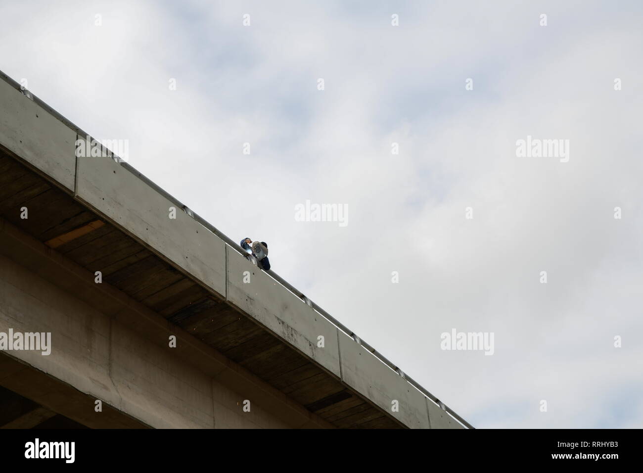 Bottom view on the bridge. Big concrete overpass. Building of the ...