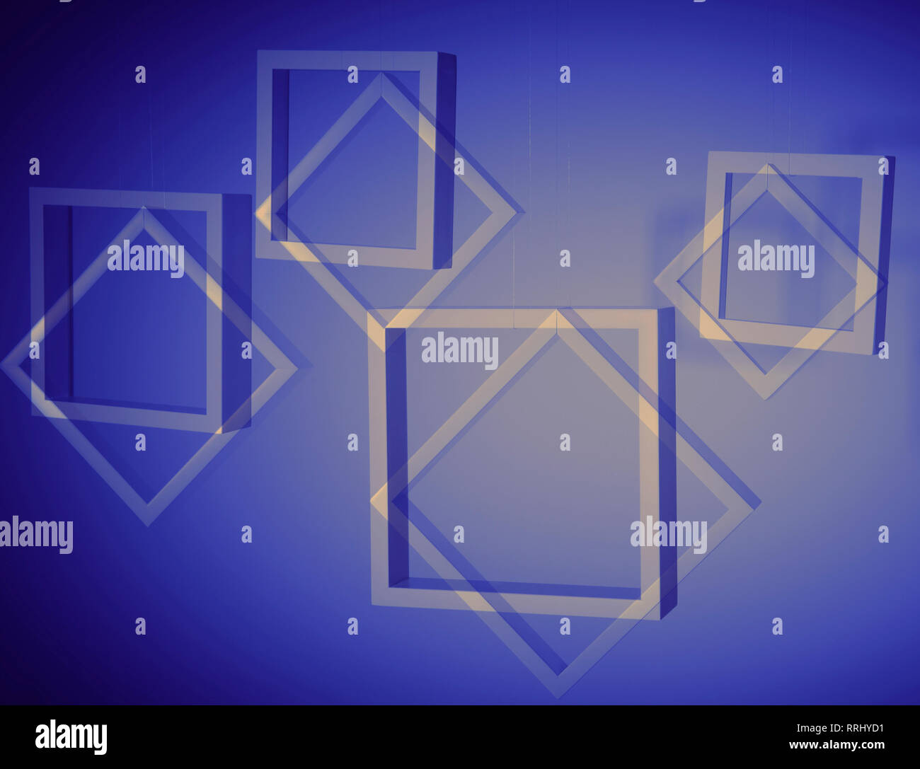 Eight overlaid floating square white frames of various sizes on a ...