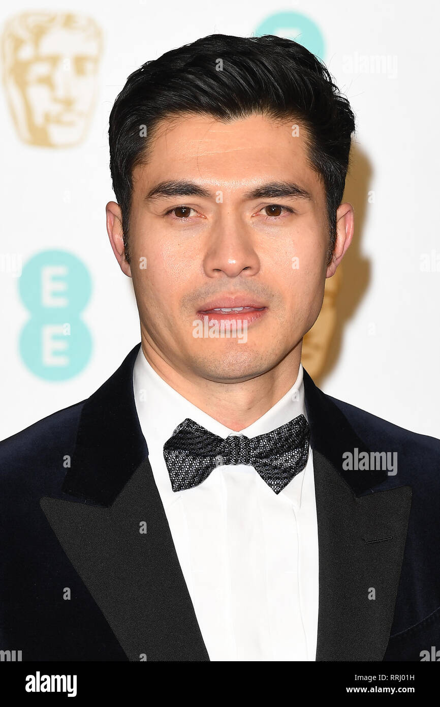 Henry Golding attends the EE British Academy Film Awards at The Royal ...
