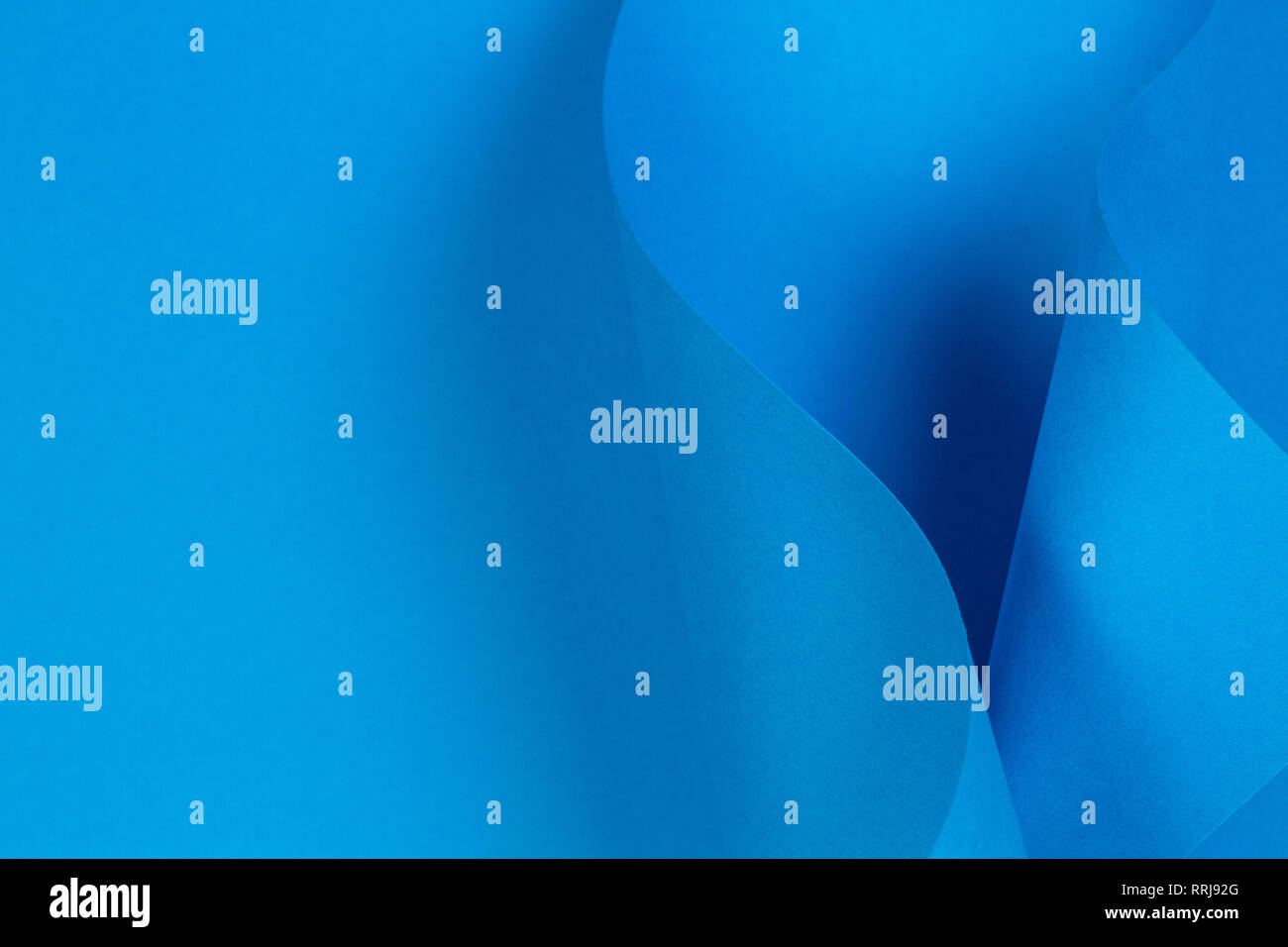 Abstract light blue paper background in geometric shapes Stock Photo ...