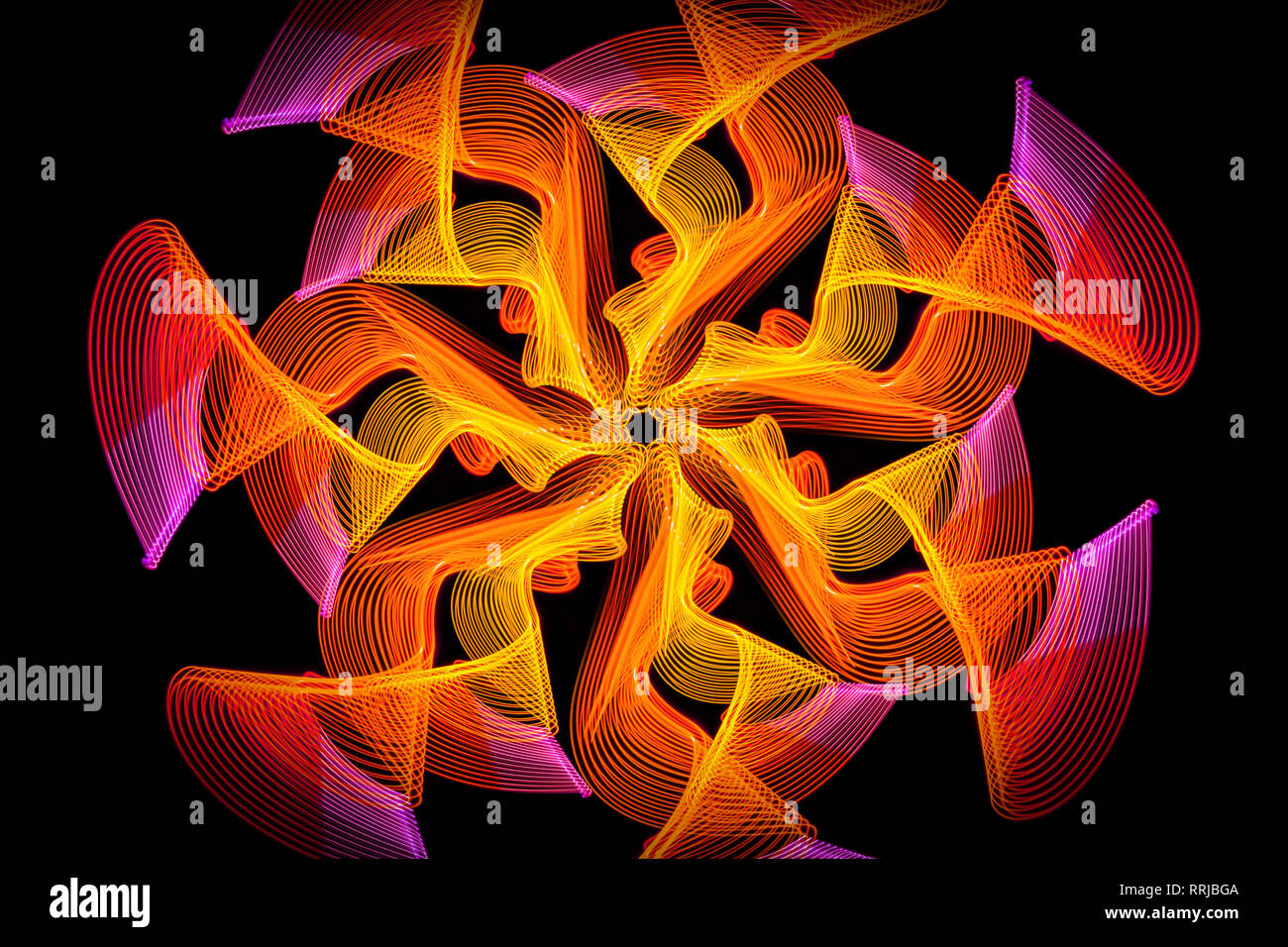 Colorful pink, yellow and orange neon spiral lines.Abstract background of blue neon glowing ...