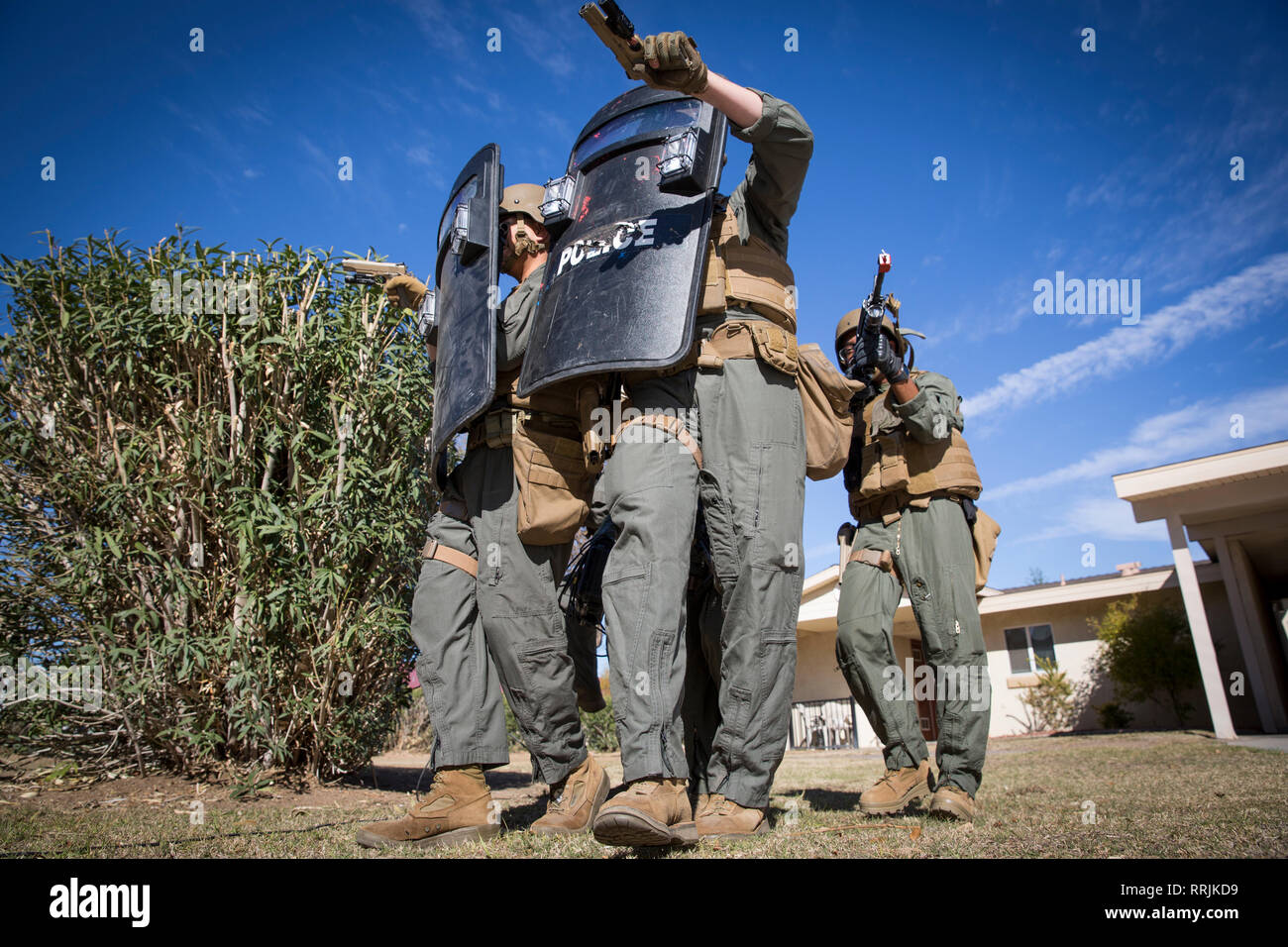 U.S. Marines with the Provost Marshal's Office (PMO), Headquarters and ...
