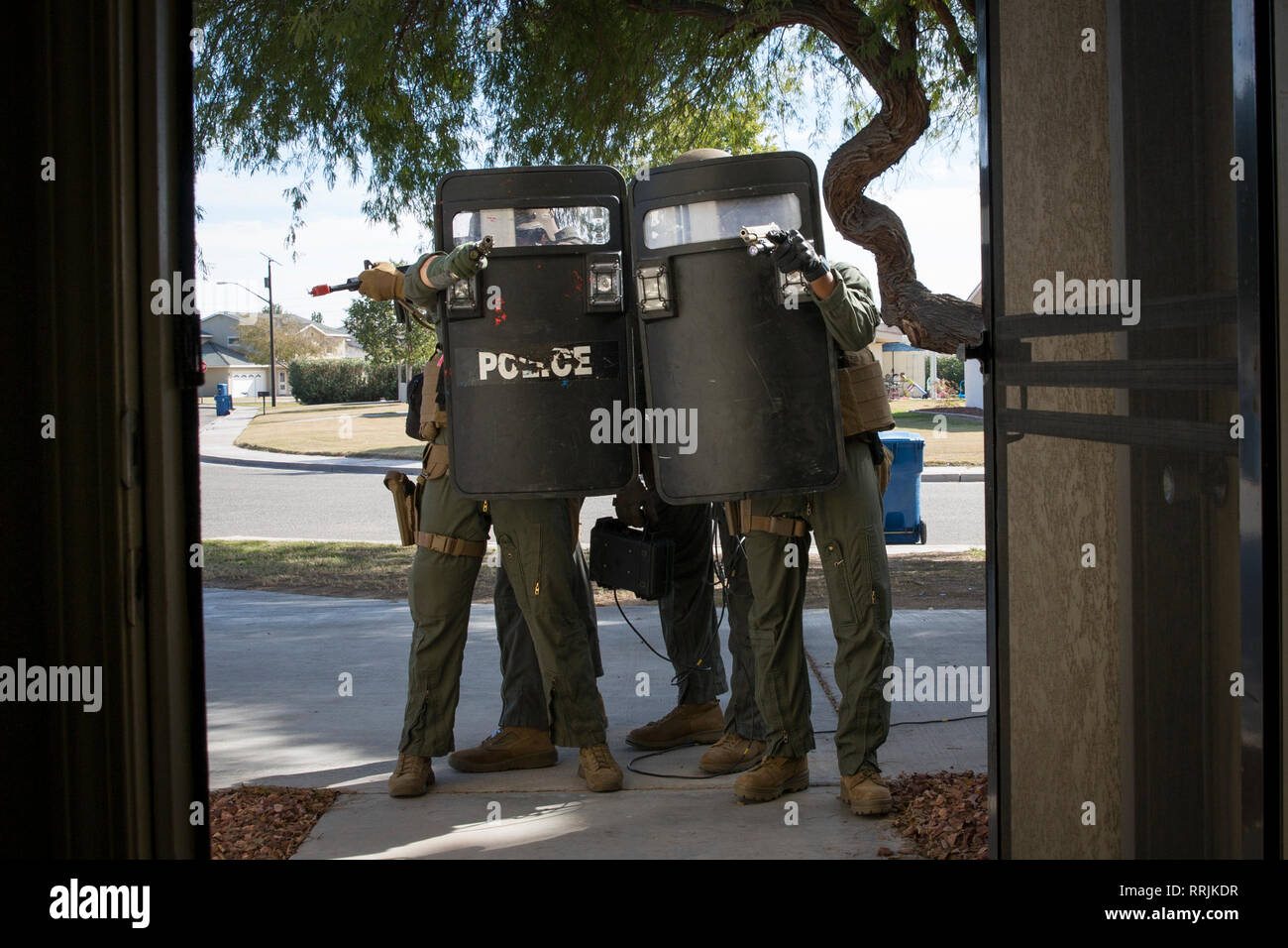 U.S. Marines with the Provost Marshal's Office (PMO), Headquarters and ...