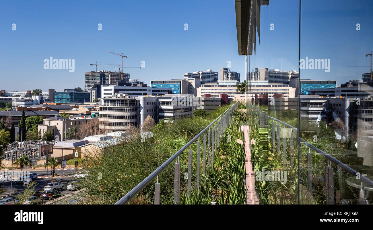 Johannesburg, South Africa, 30 November - 2018: Skyline reflected on ...