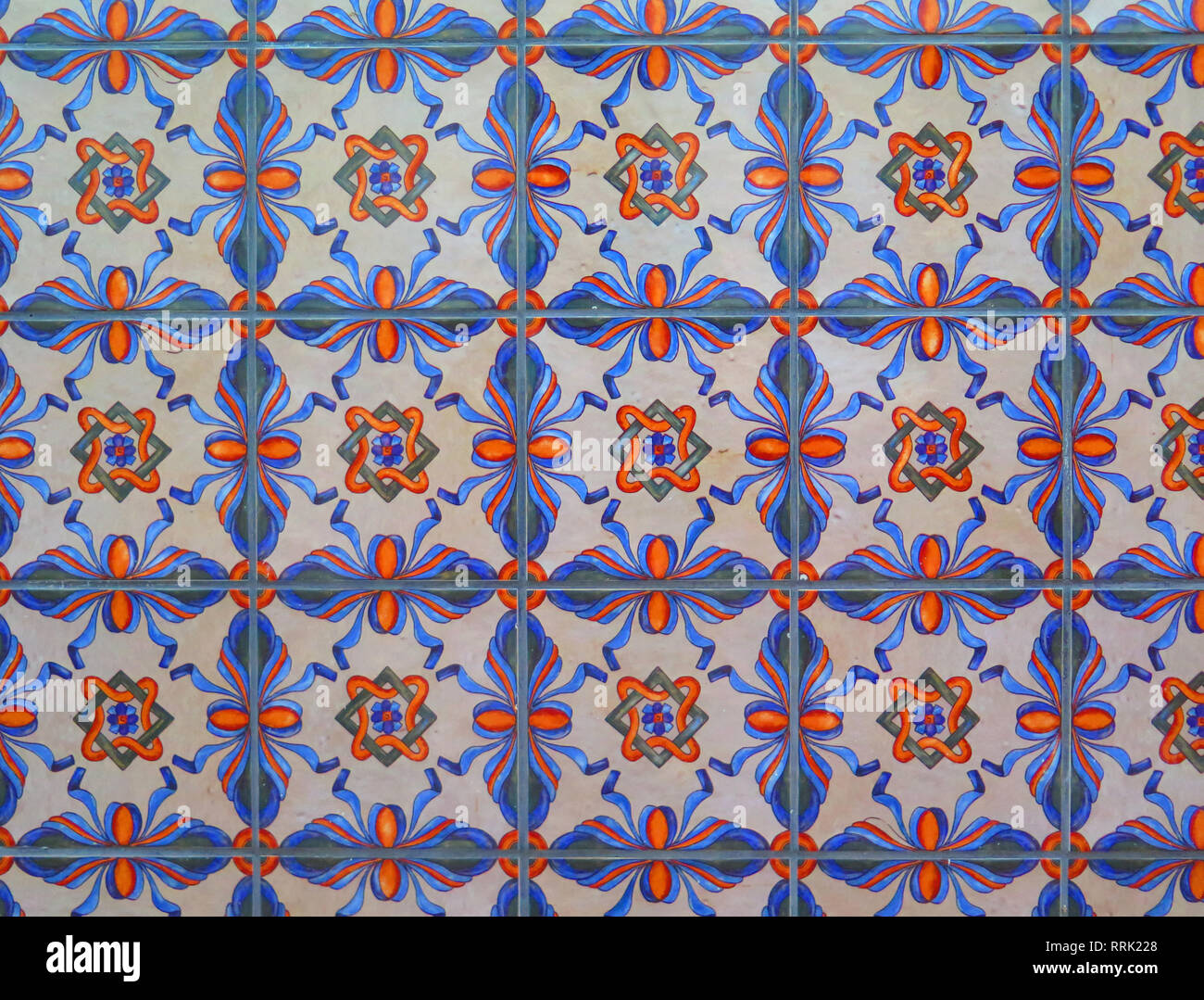 Closeup of Wall tiled with colorful ceramic tiles in village in ...