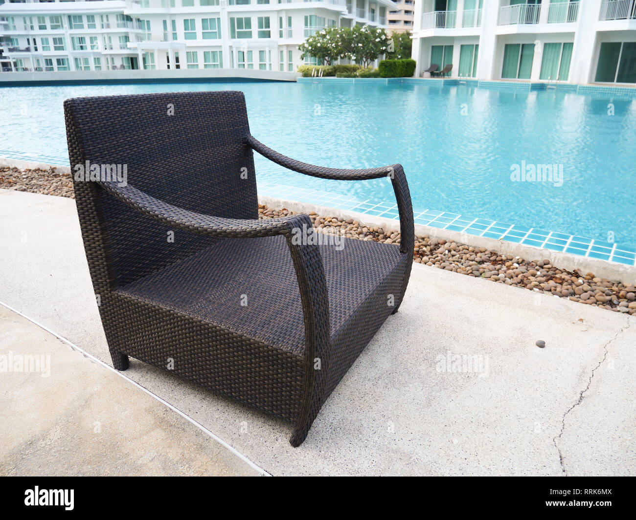 Chairs at the pool, grey plastic pool chair, Sunny summer vacation ...