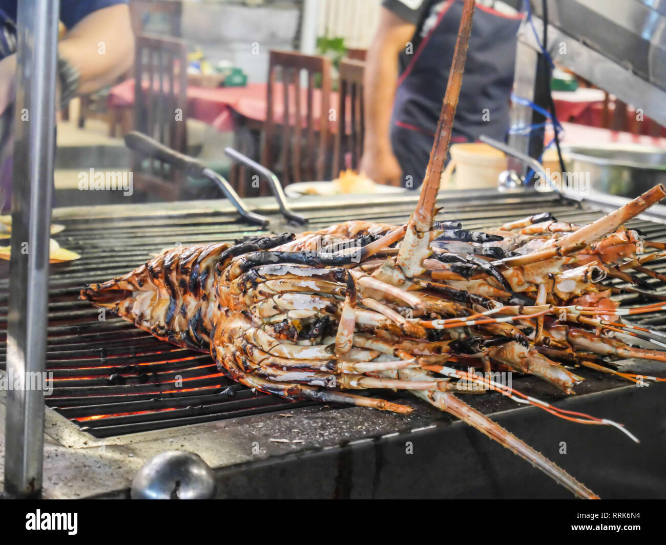 Grilled Lobster on a gridiron over fire at the seafood night market ...