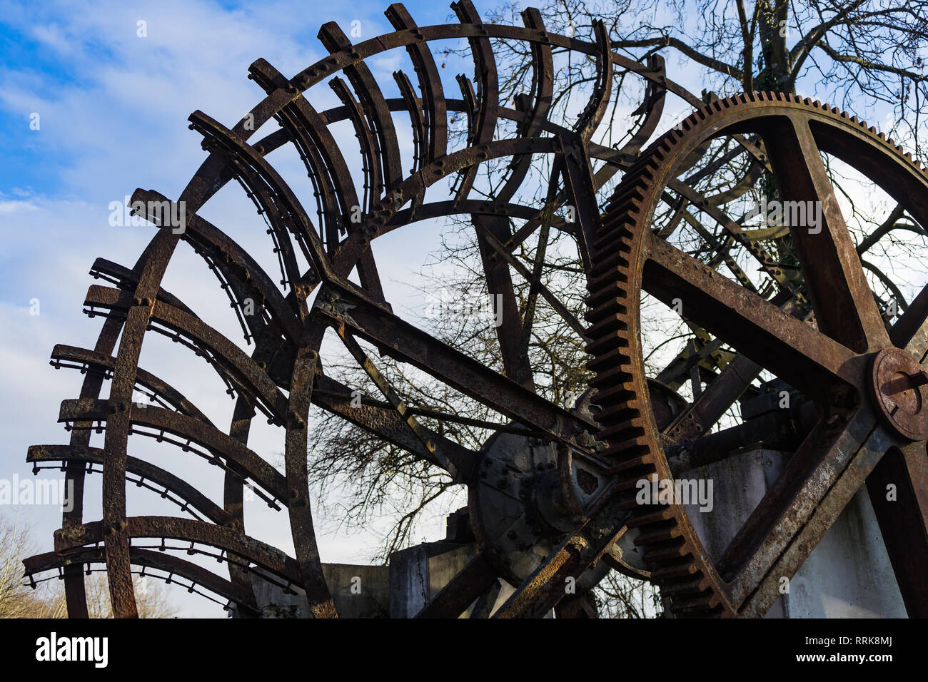 Water wheel made of metal and wood in use, carries water Stock Photo ...