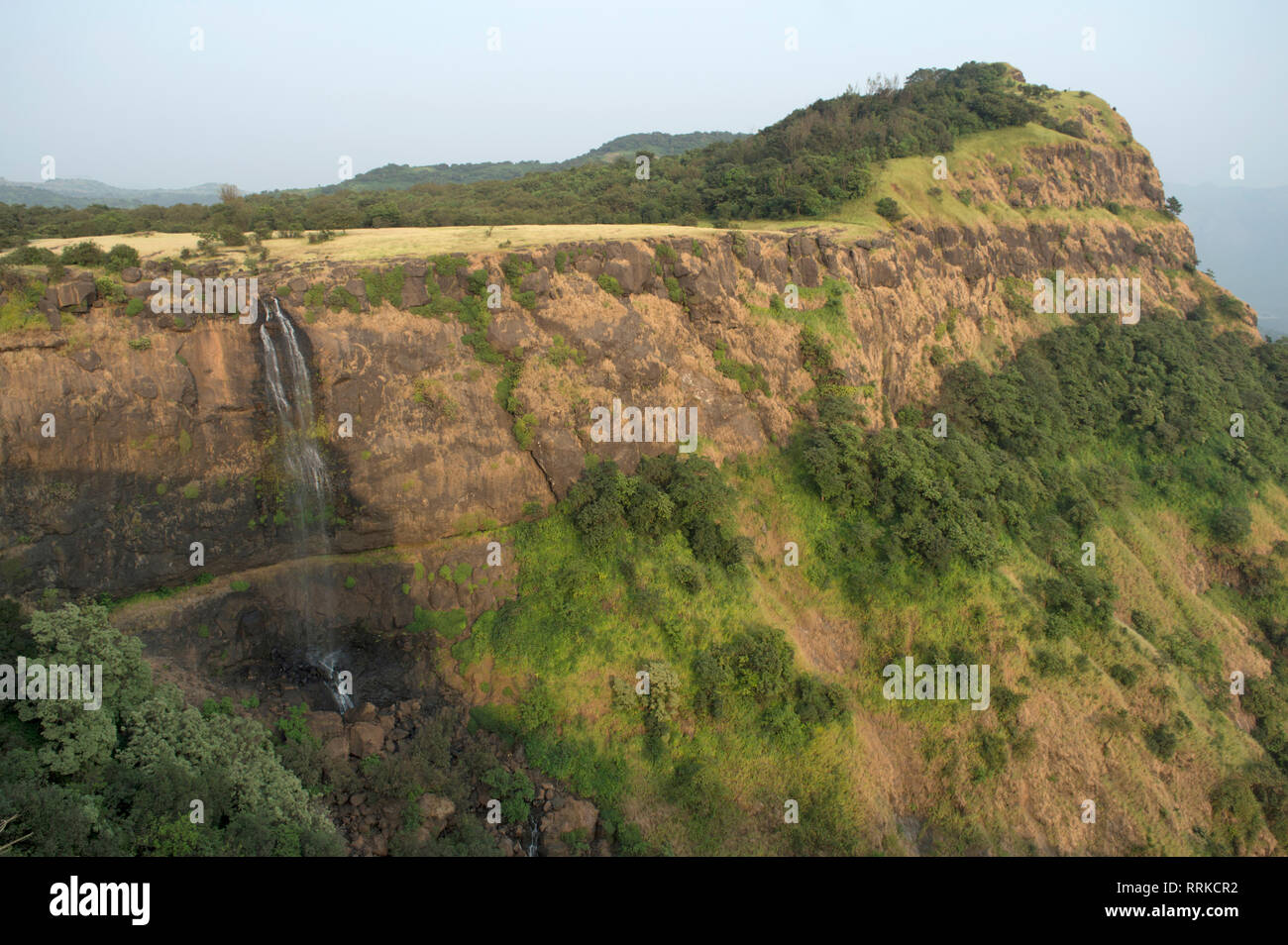 Landscape view of a waterfall and mountain near Made Ghats, Pune ...