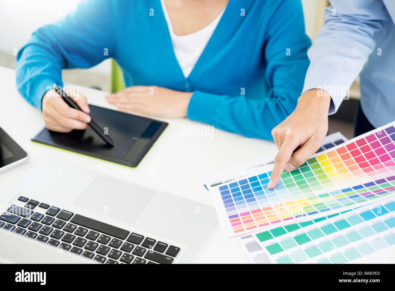 Creative or Interior designers teamwork with pantone swatch and ...