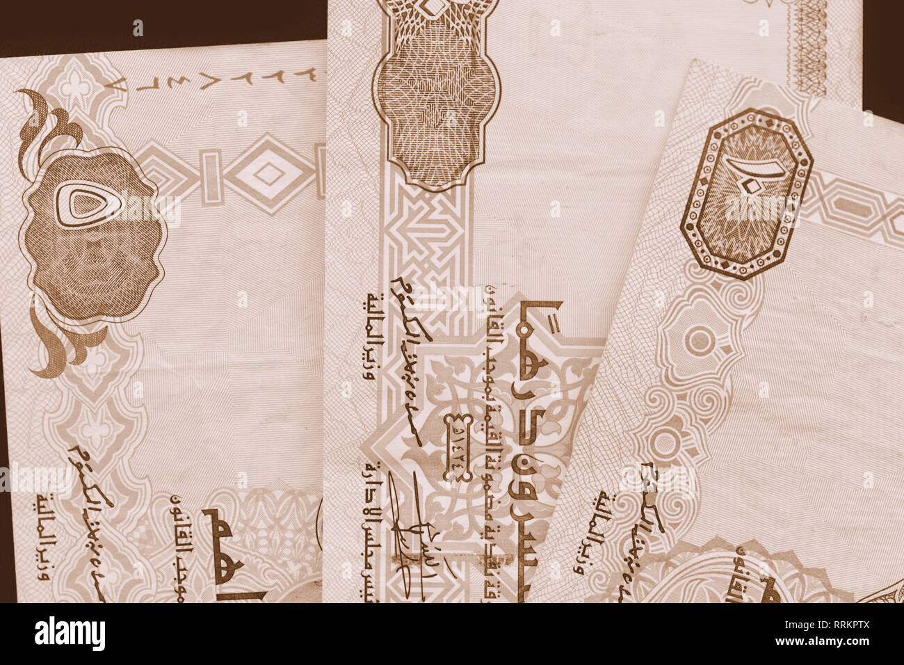UAE dirham currency background close up. Brown color toned Stock Photo ...