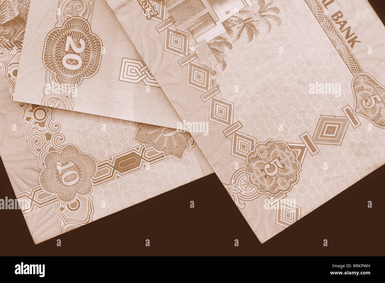 UAE dirham currency background close up. Brown color toned Stock Photo ...
