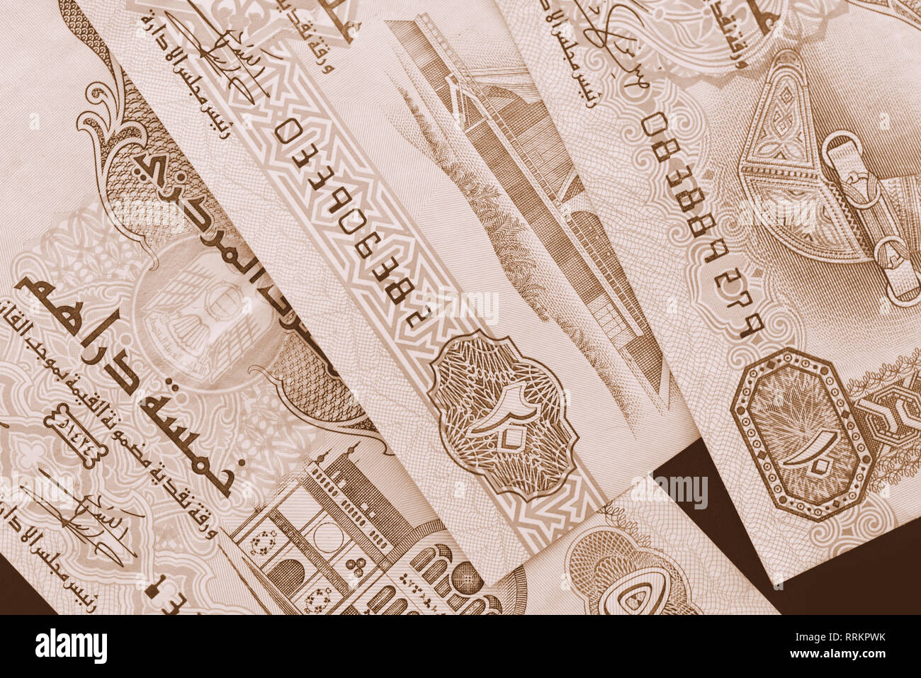 UAE dirham currency background close up. Brown color toned Stock Photo ...