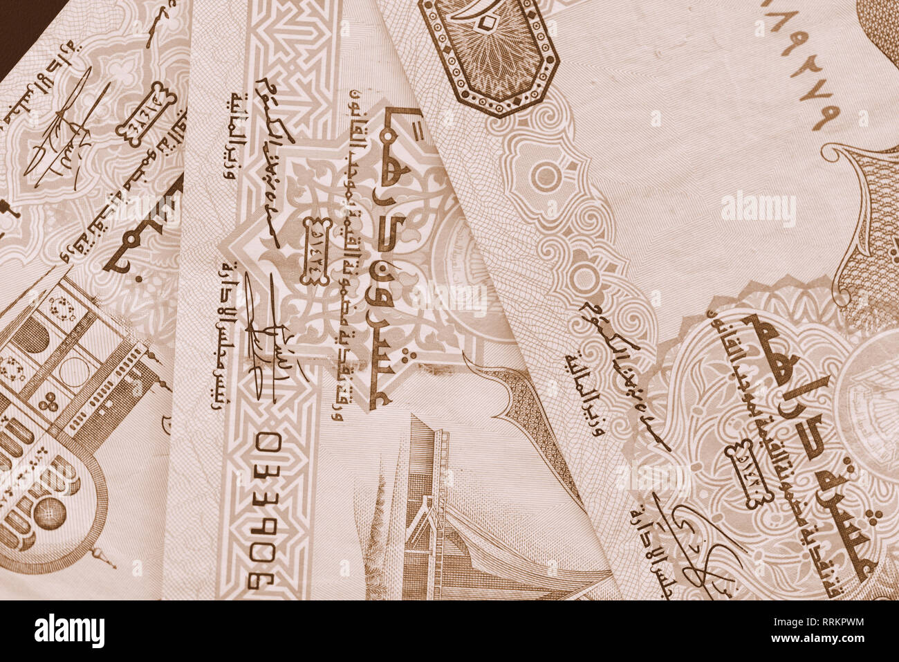 UAE dirham currency background close up. Brown color toned Stock Photo ...