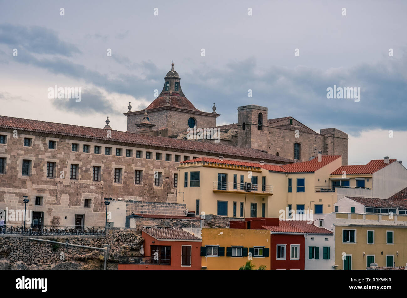 Santa Maria de Maó cathedral in Mahon, Spain, seen over some buildings ...